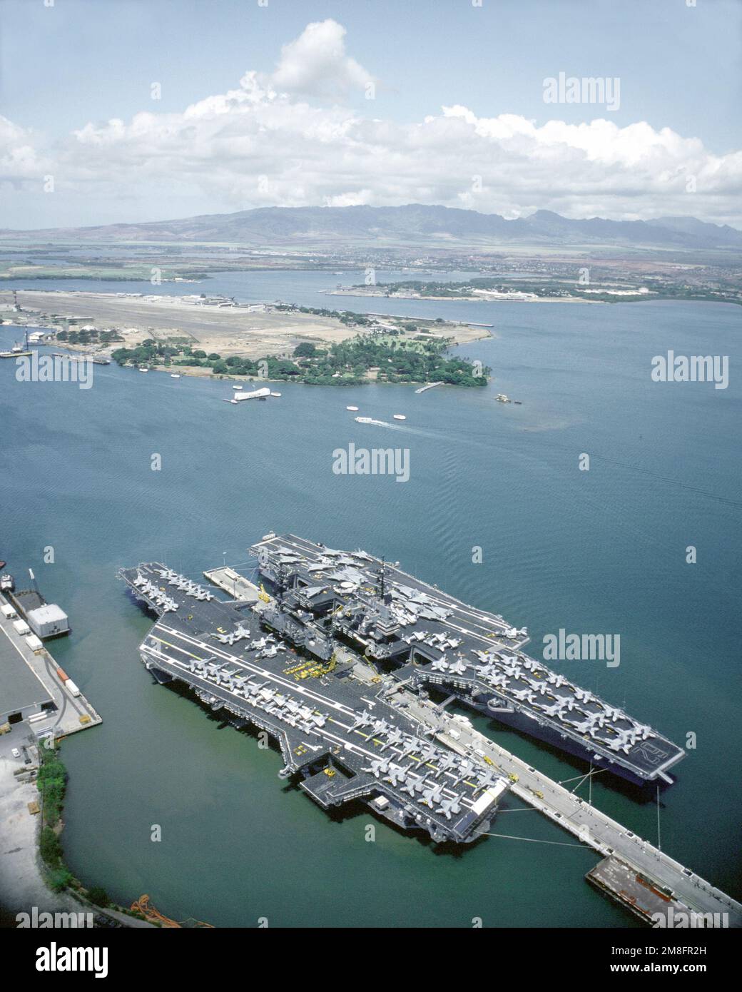 The aircraft carriers USS MIDWAY (CV-41), lower left, and USS ...