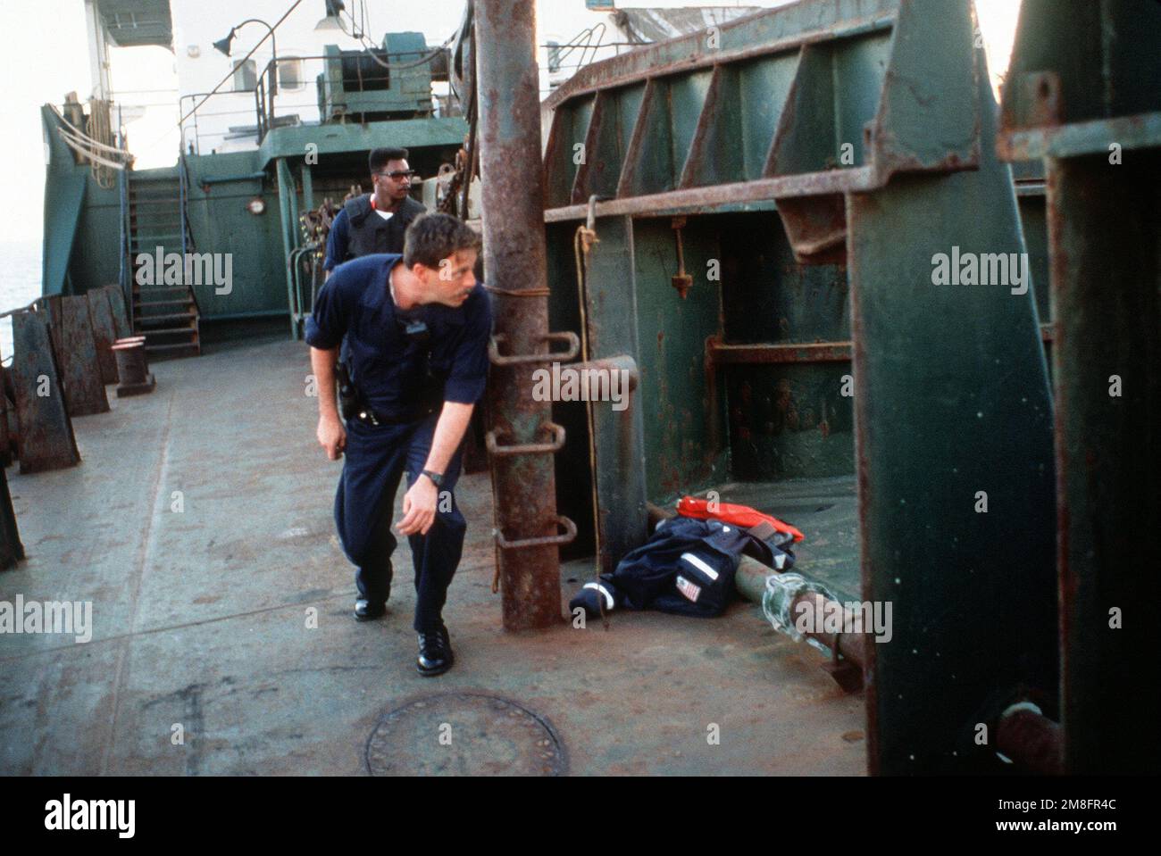 Coast Guard CHIEF GUNNER's Mate John Hagy, foreground, and Navy Sonar ...