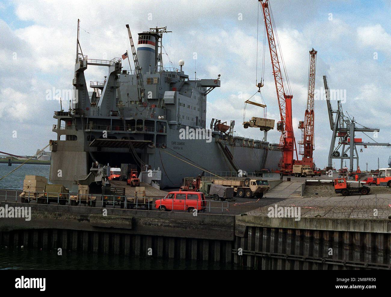 Equipment is offloaded from the Military Sealift Command vehicle cargo ...