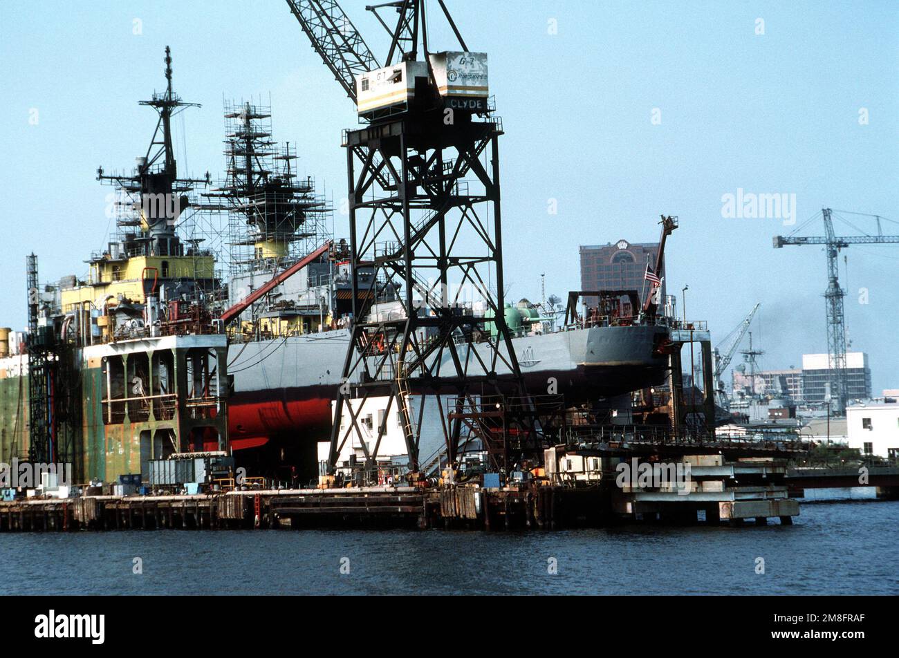 The guided missile cruiser USS JOSEPHUS DANIELS (CG 27) sits in the ...