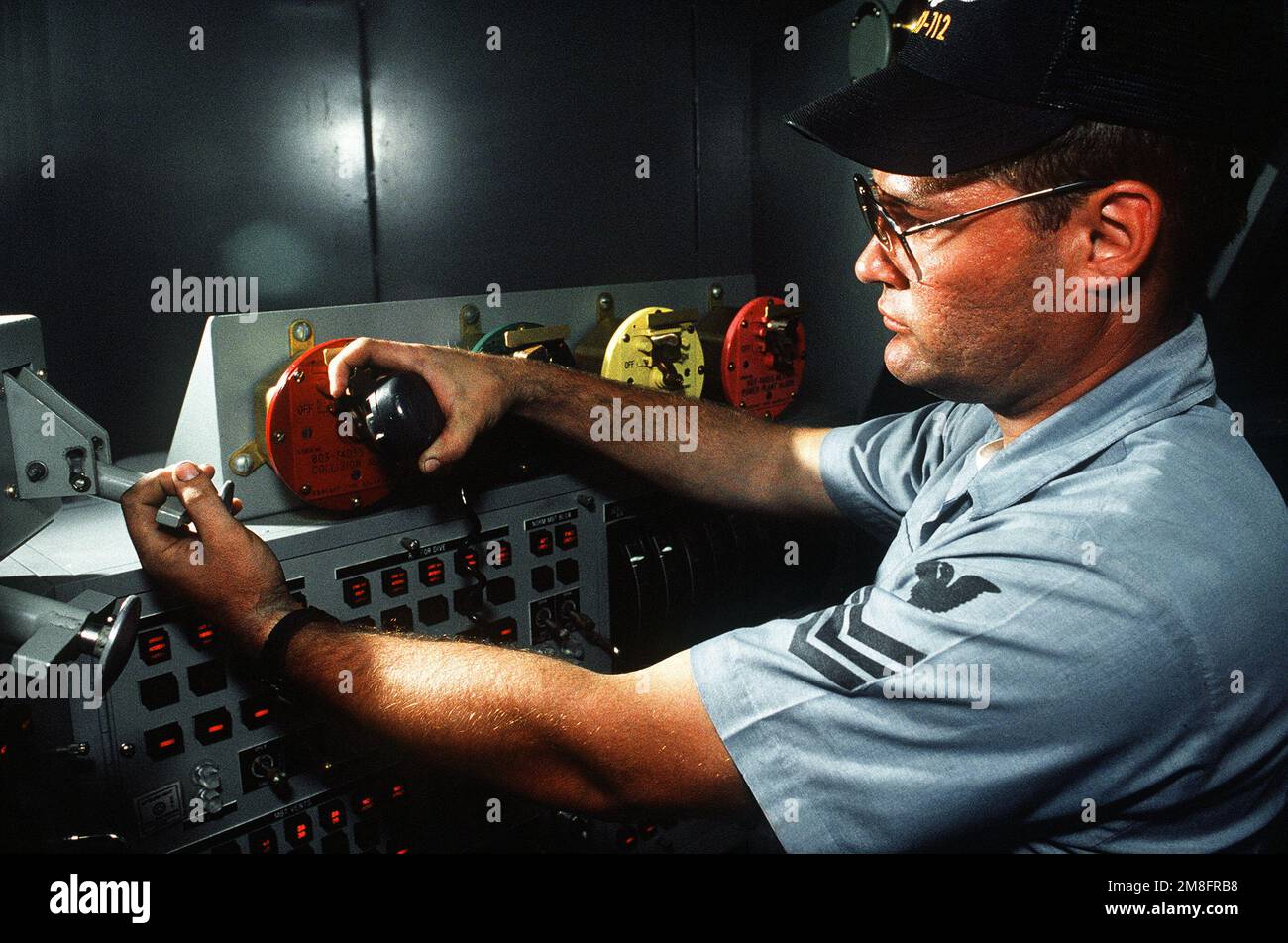 The chief of the watch sounds a general alarm aboard the nuclear ...