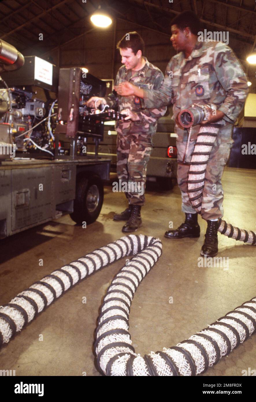 AIRMAN 1ST Class Jack Howell, left and TECH. SGT. Terry Stuart of the ...
