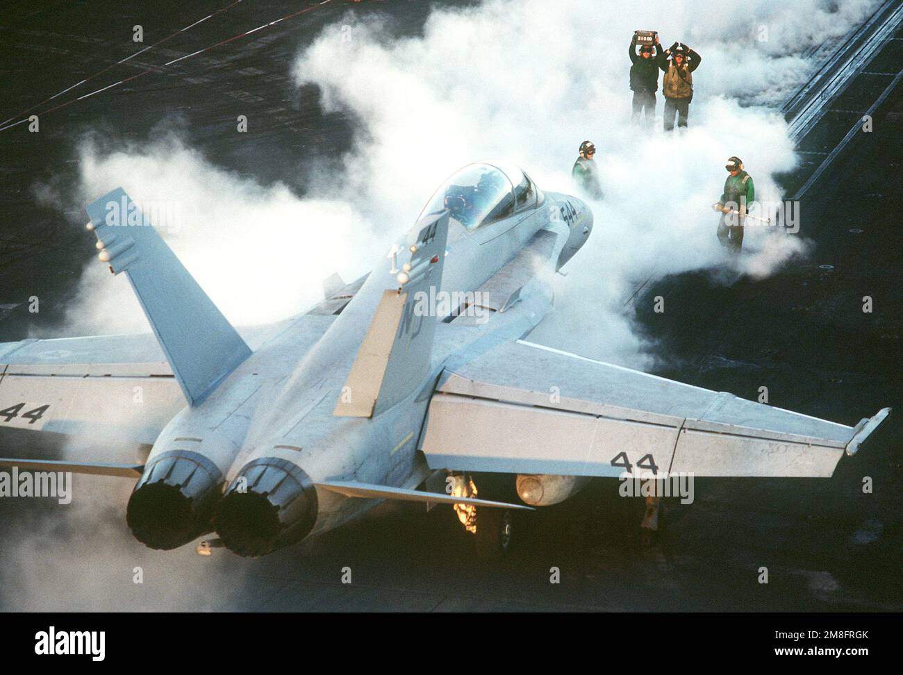 A Strike Fighter Squadron 125 (VFA-125) F/A-18D Hornet aircraft moves ...