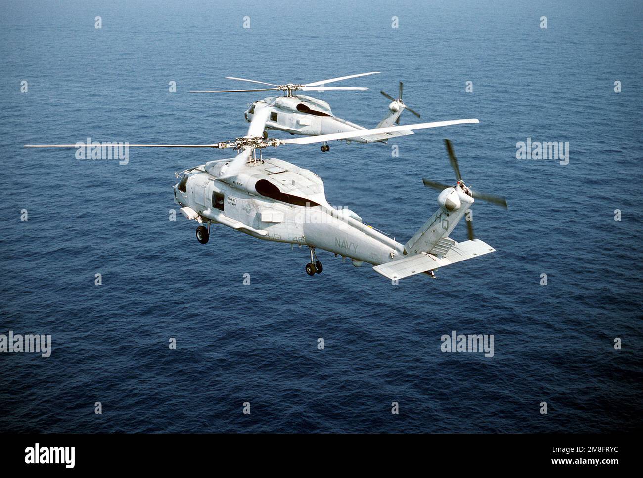Two SH-60B Sea Hawk helicopters of Light Helicopter Anti-submarine ...