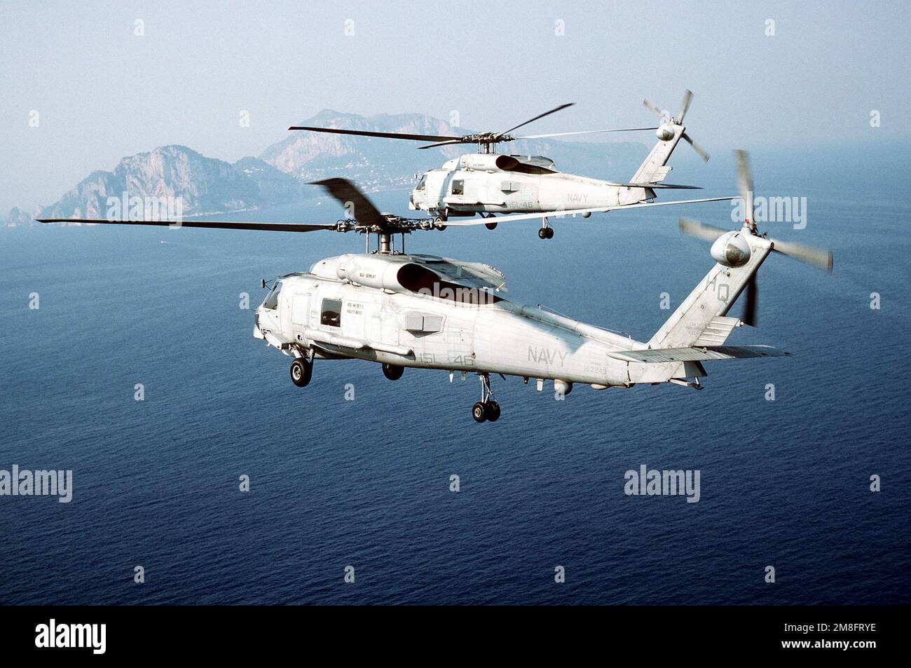 Two SH-60B Sea Hawk helicopters of Light Helicopter Anti-submarine ...