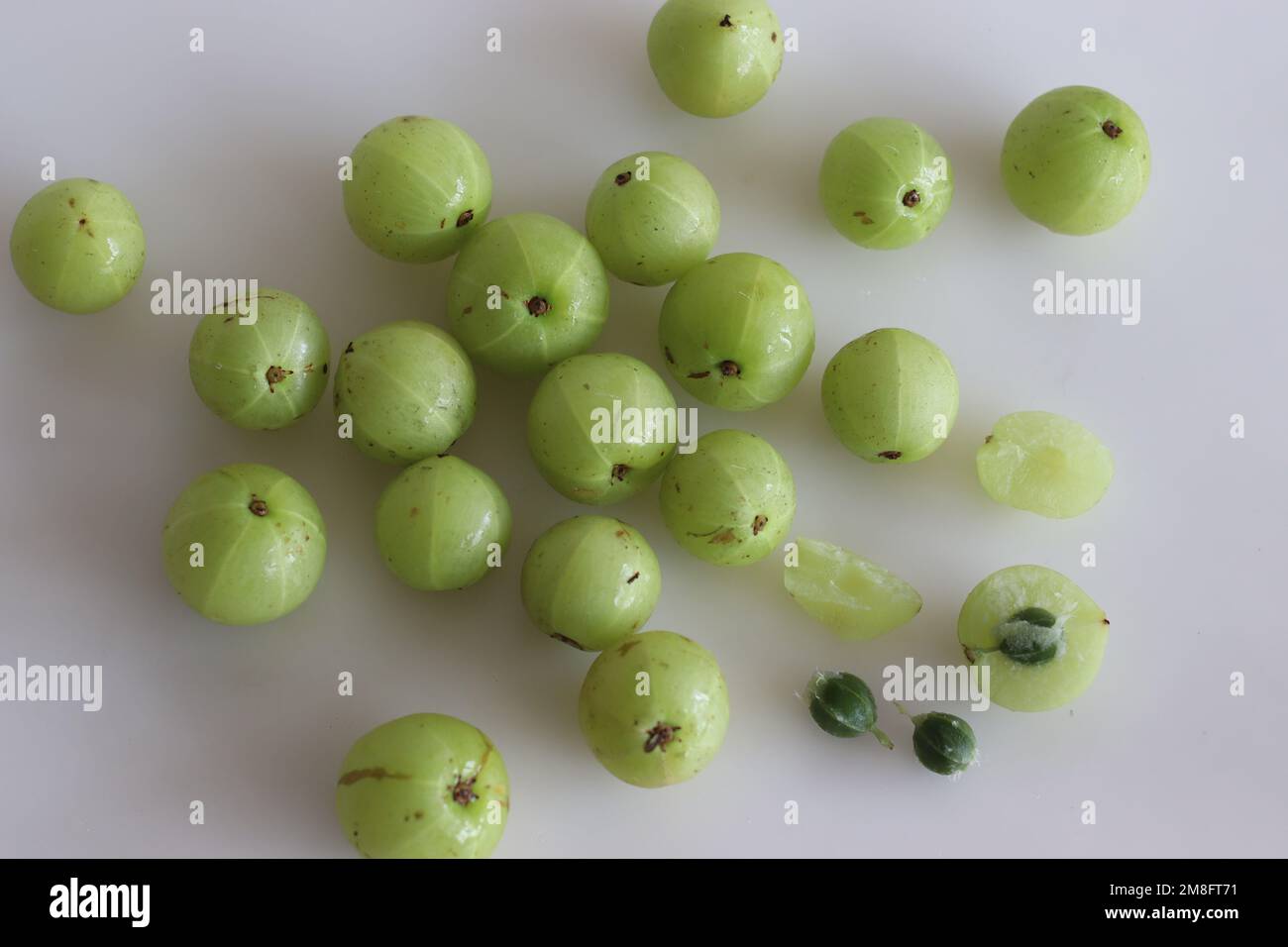 Amala or Indian Gooseberries are small, nutritious fruits produced from ...