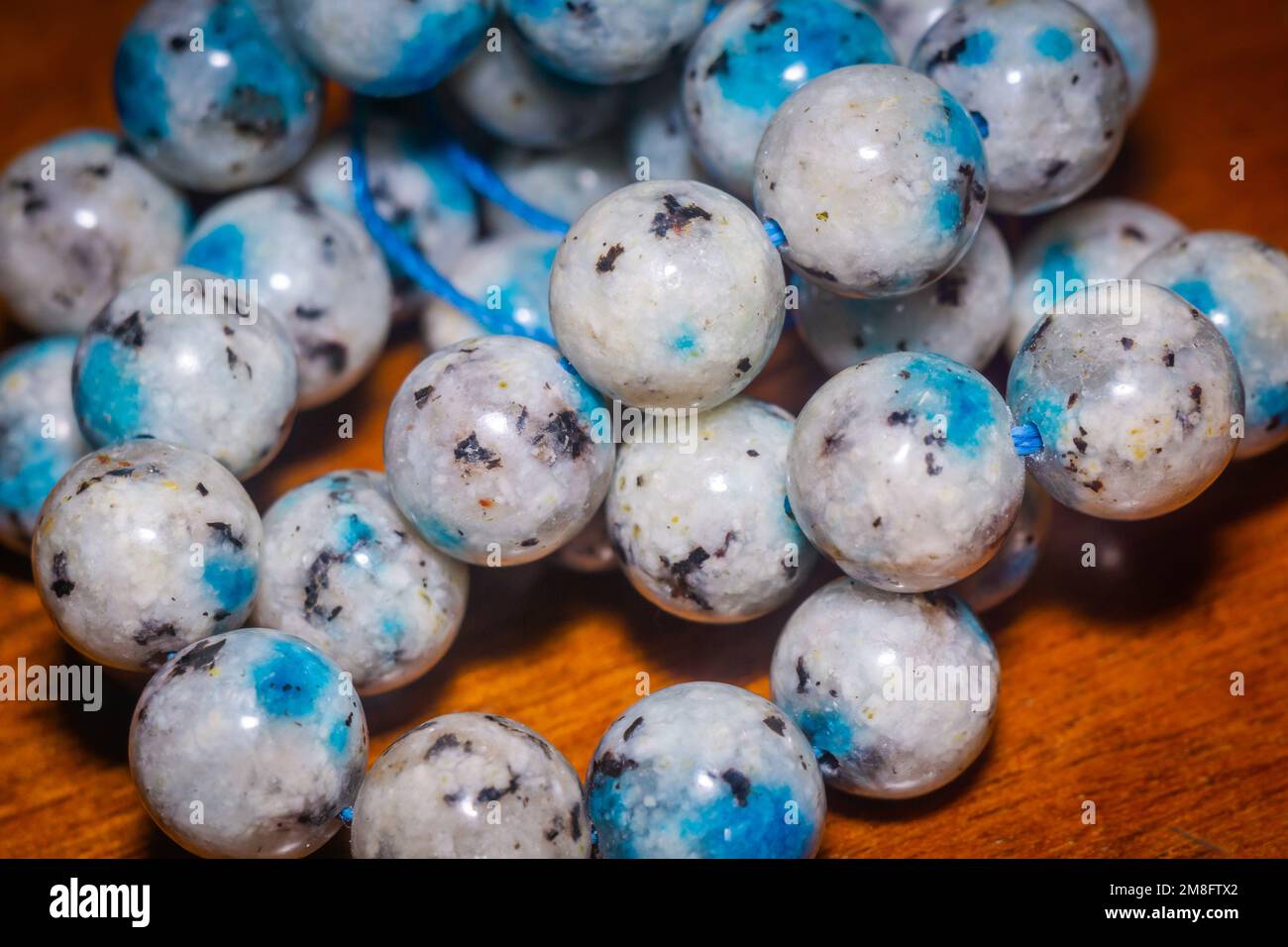 Natural blue white azurite stone beaded necklace Stock Photo - Alamy