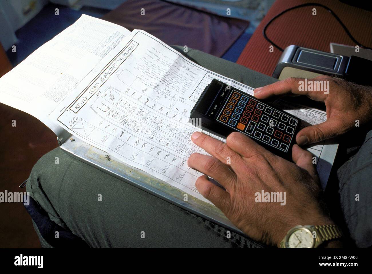 SMSGT Ted Whorley calculates a weight load plan for a Strategic Air ...
