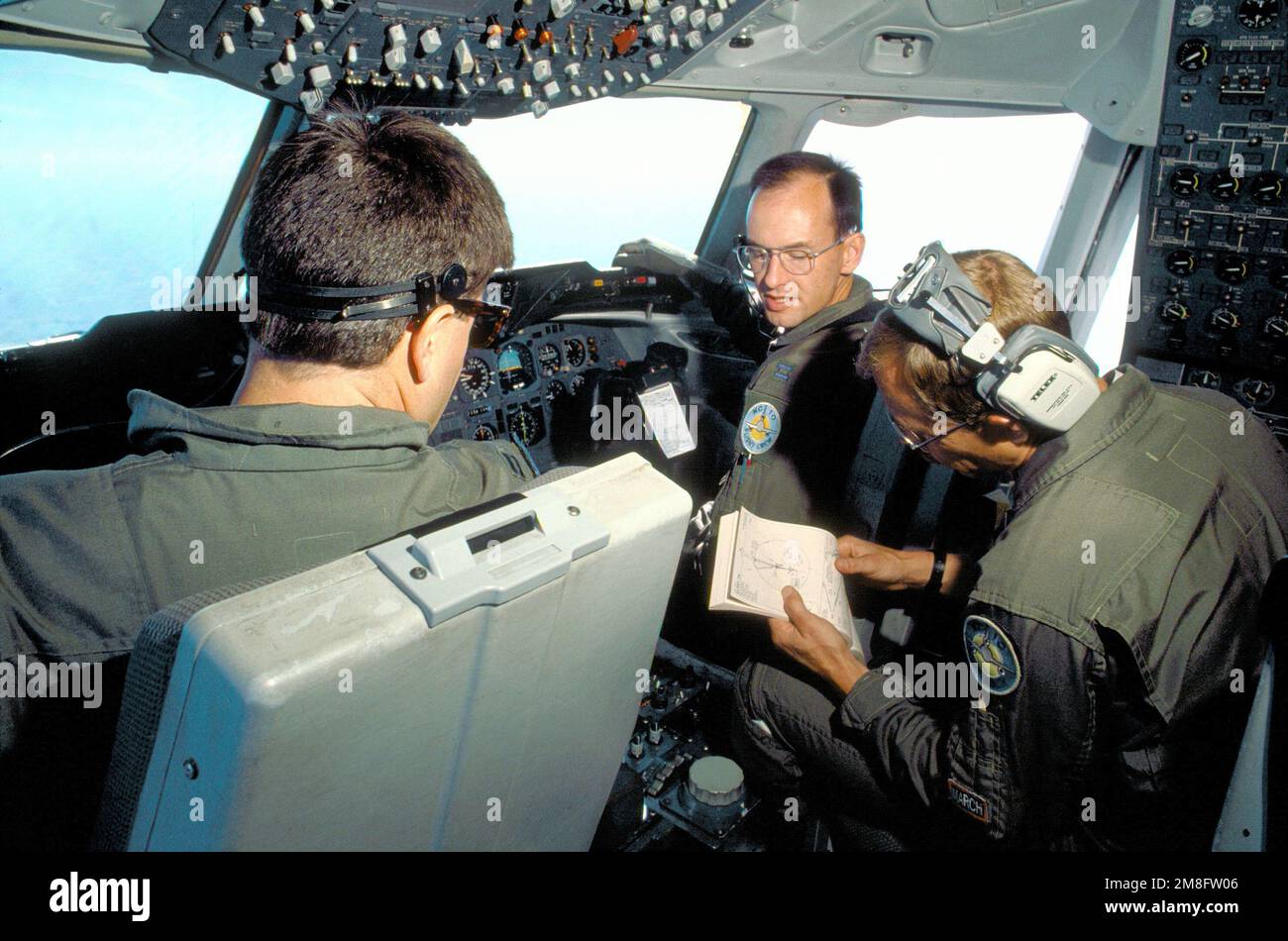 Members of a 6th Aerial Refueling Squadron aircrew monitor controls in ...