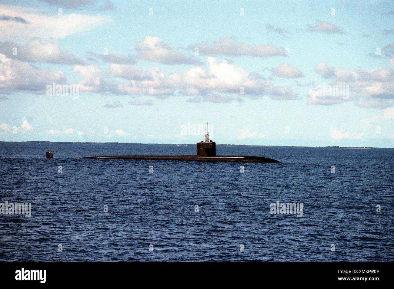 A starboard beam view of the nuclear-powered attack submarine USS ...
