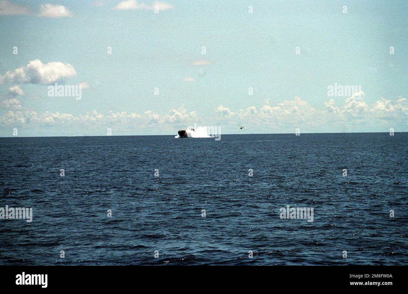 The nuclear-powered attack submarine USS PITTSBURGH (SSN 720) surfaces ...