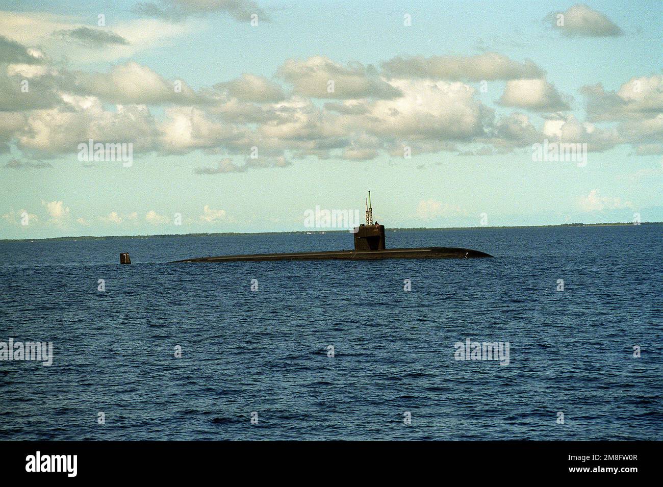 A starboard beam view of the nuclear-powered attack submarine USS ...
