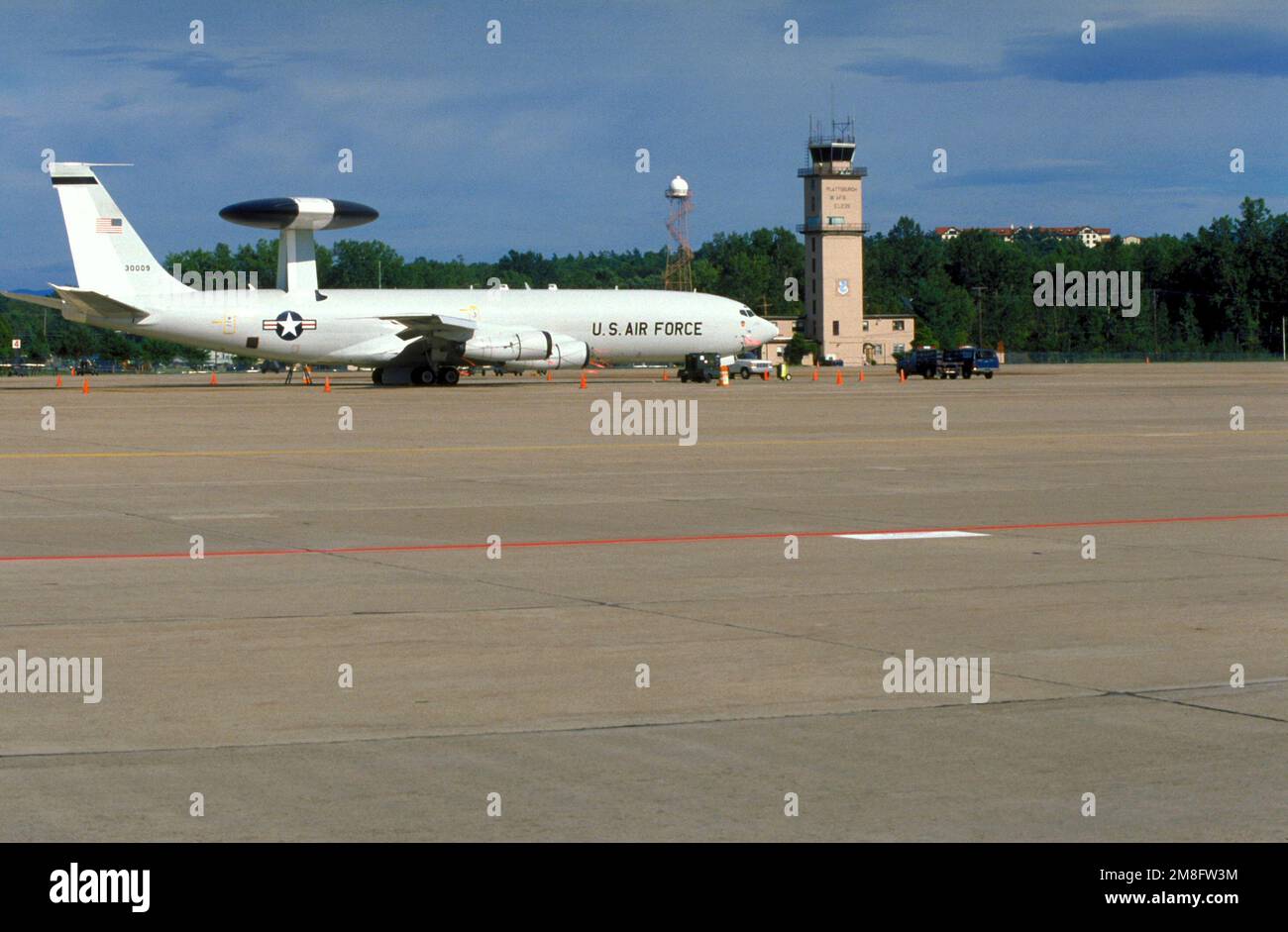 An E-3A Sentry aircraft is serviced on the flight line.. Base ...