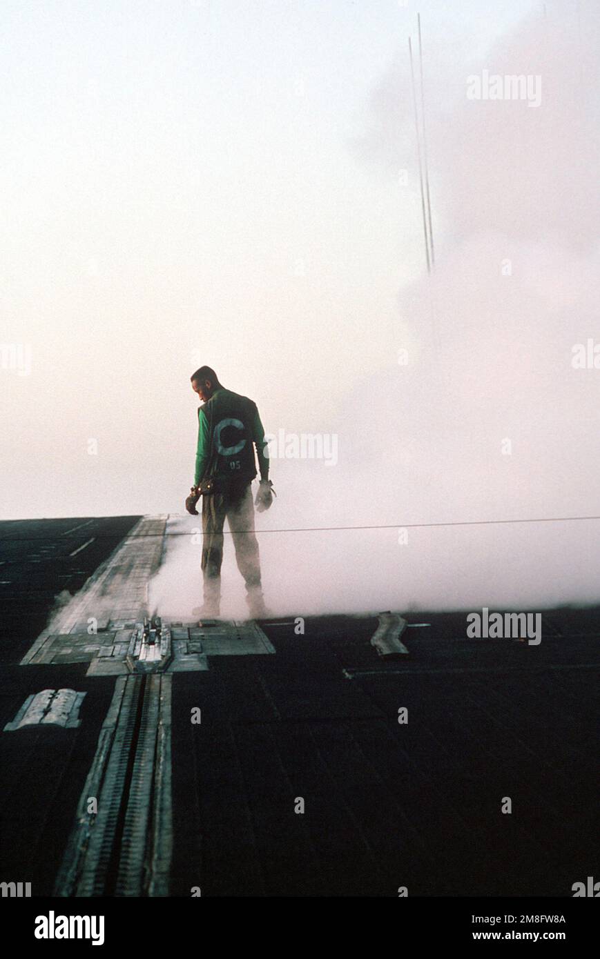 Aviation Boatswain's Mate 3rd Class Ronnie Josey inspects the shuttle ...