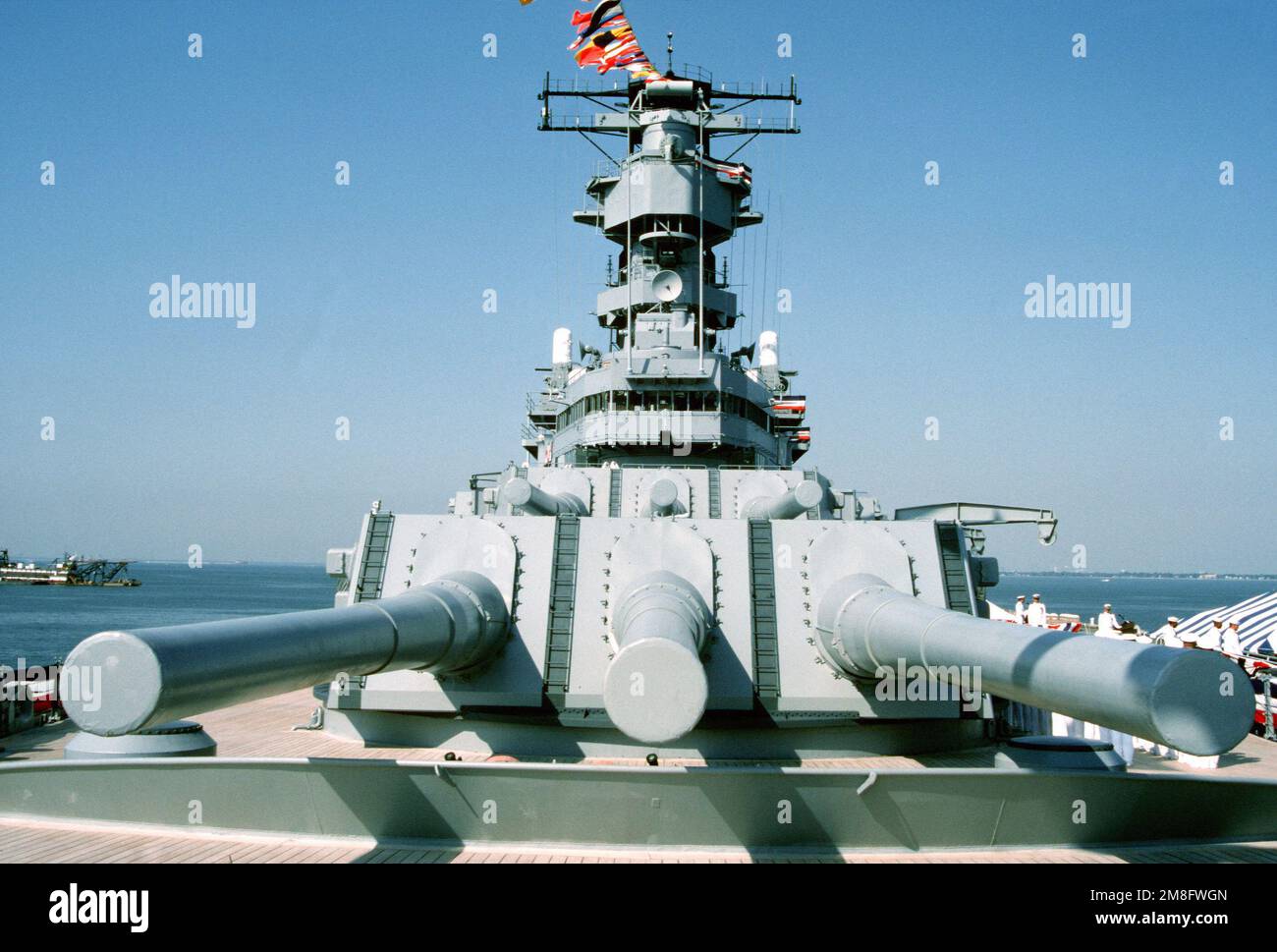 A view of two of the Mark 7 16-inch/50-caliber gun turrets and the ...