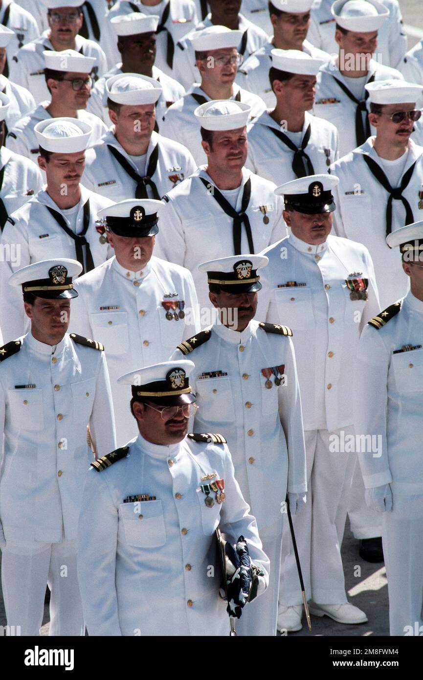 LCDR Louis Meier, lower left, executive officer of the guided missile ...