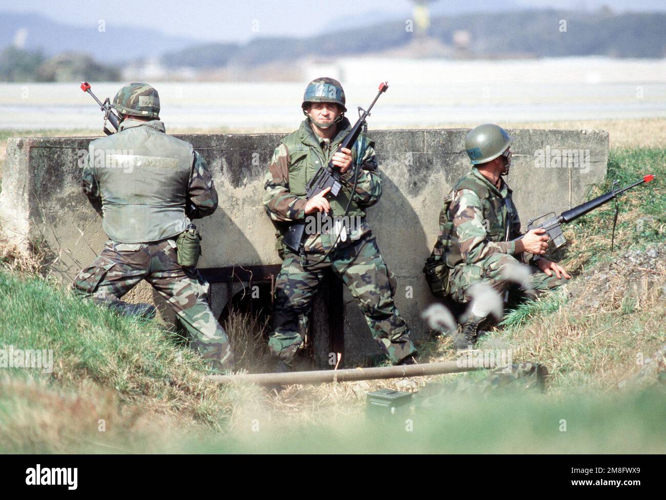 Members of the 38th Air Rescue Squadron guard their position during the ...
