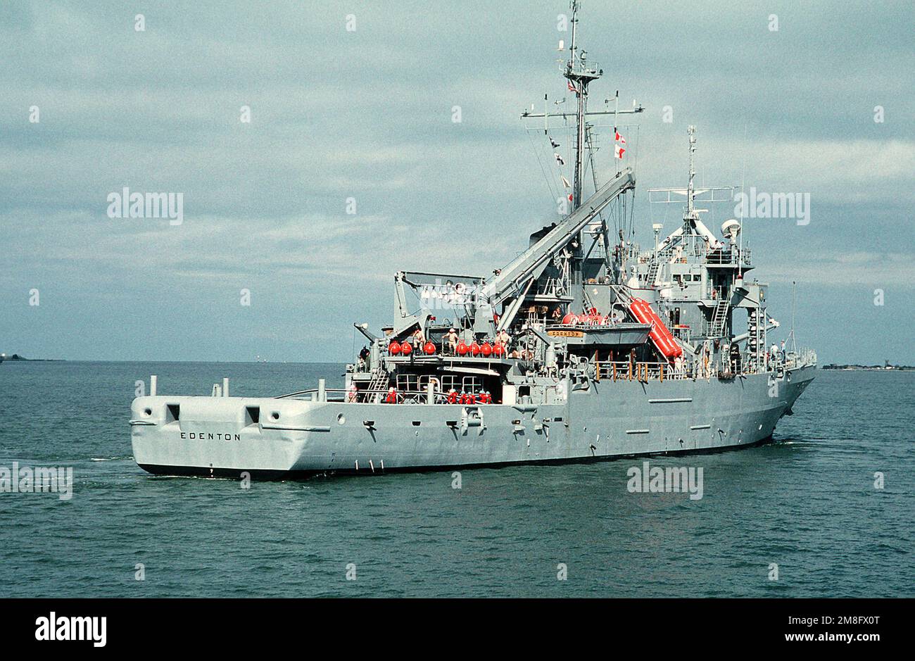 The salvage and rescue ship USS EDENTON (ATS-1) approaches port in ...