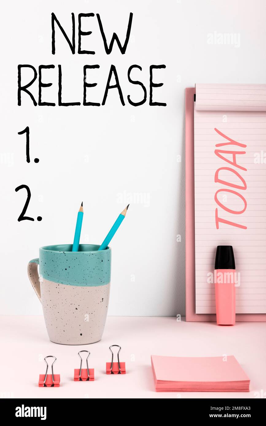 Hand writing sign New Release. Conceptual photo announcing something ...