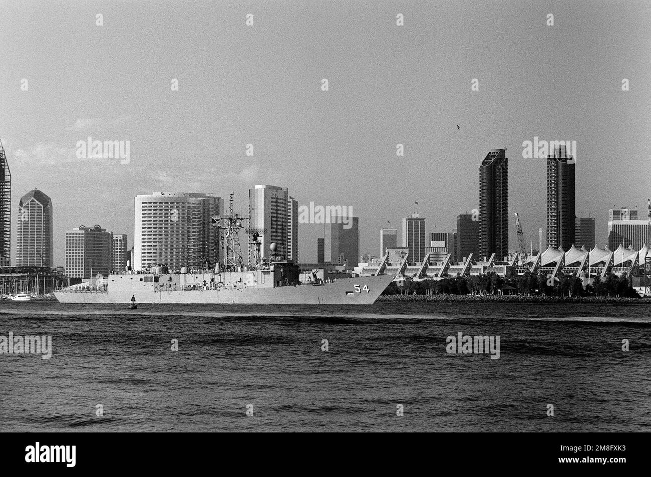 The guided missile frigate USS FORD (FFG-54) passes in review as part ...
