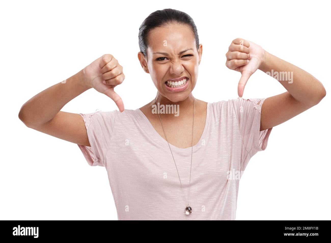 Woman, thumbs down and unhappy expression for disagreement, wrong or ...