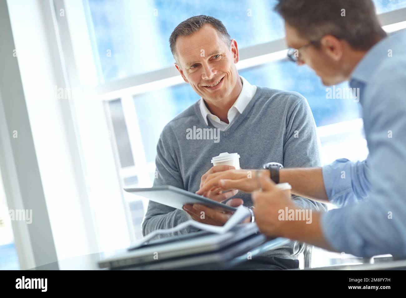 Happy corporate or business people in airport for global invest ...