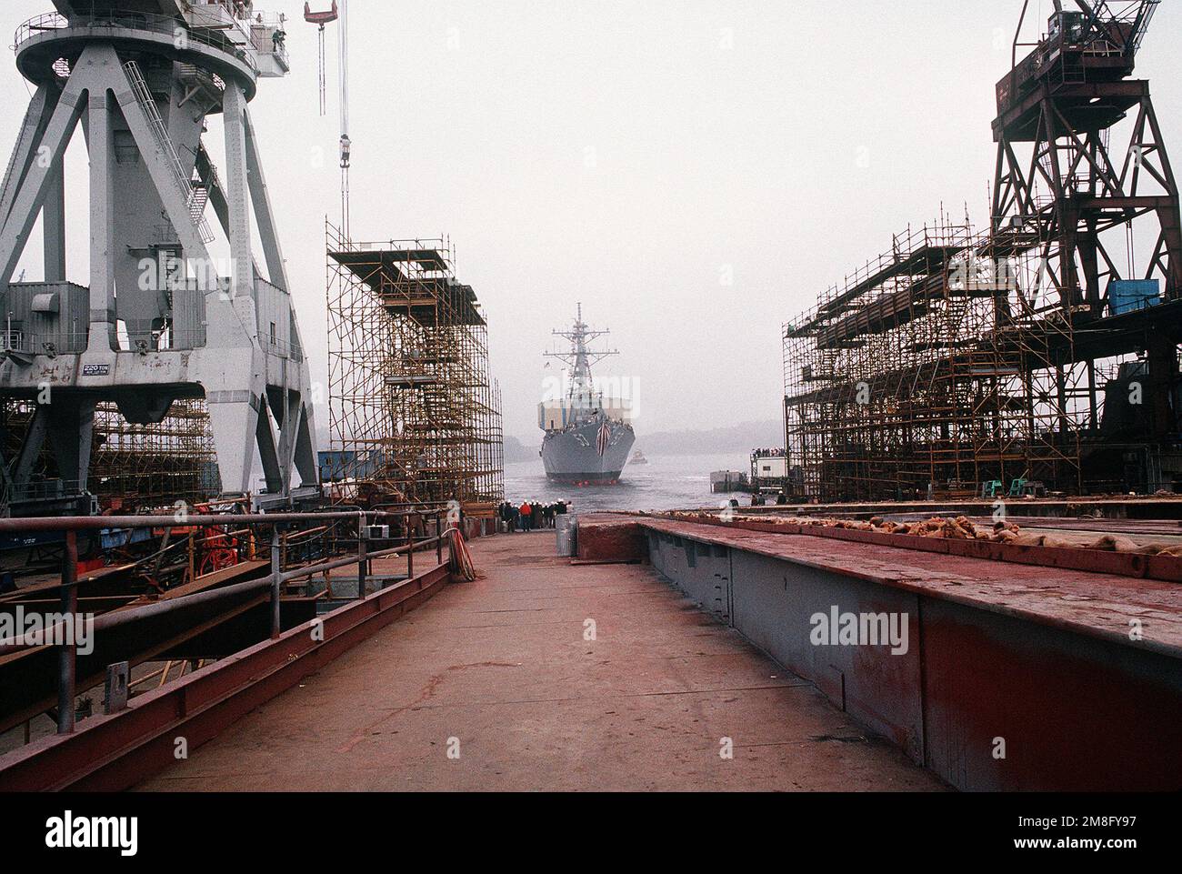 The guided missile destroyer JOHN PAUL JONES (DDG-53) slides down the ...