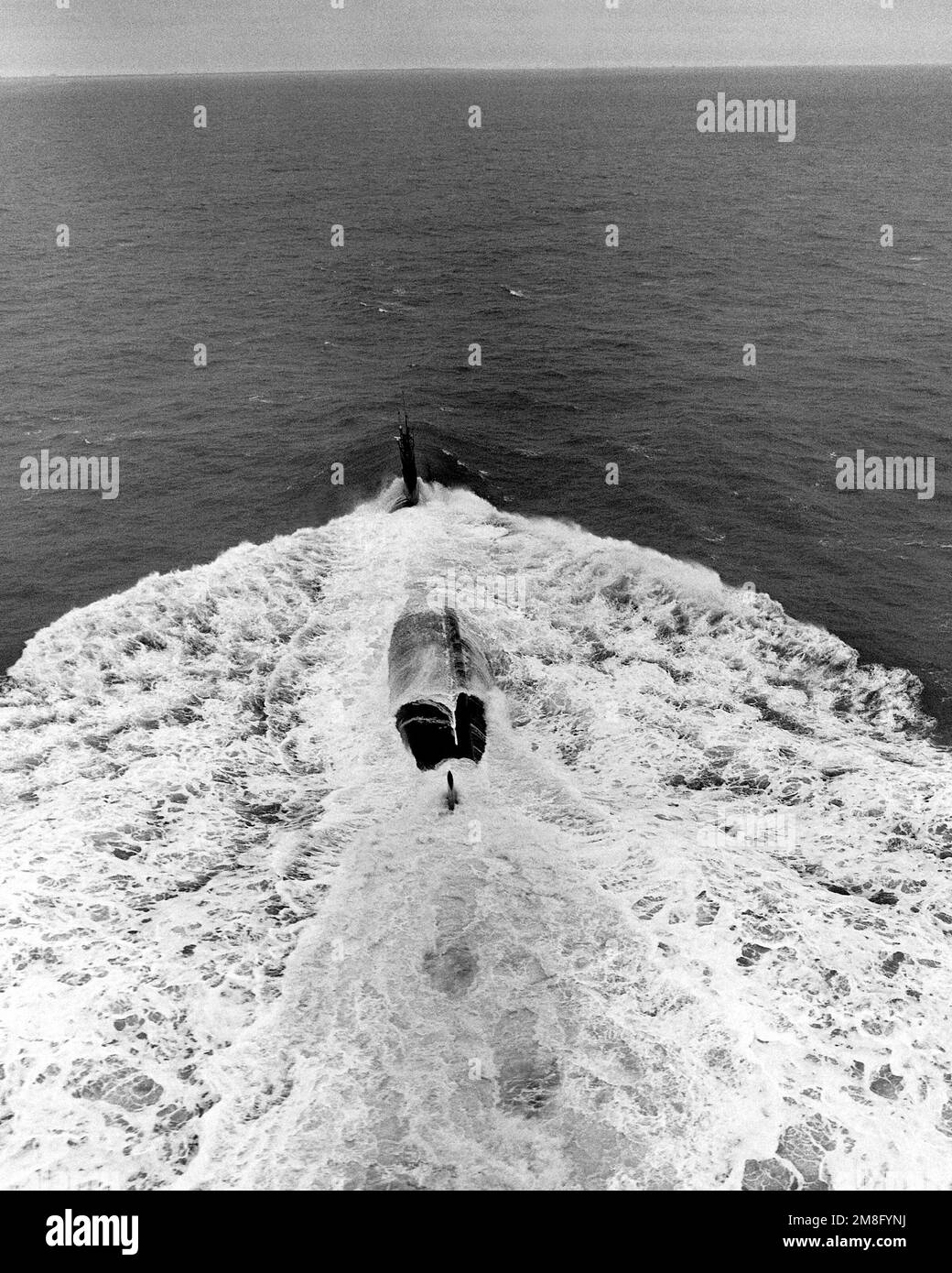A stern view of the nuclear-powered attack submarine USS JEFFERSON CITY ...