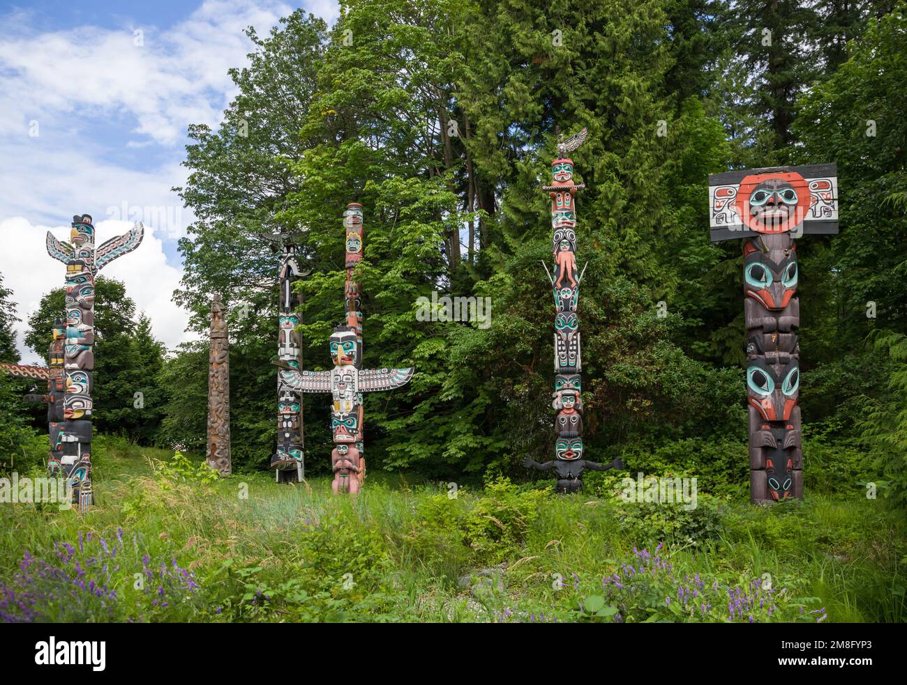 Wooden totem poles in Stanley Park. First Nations culture, travel ...