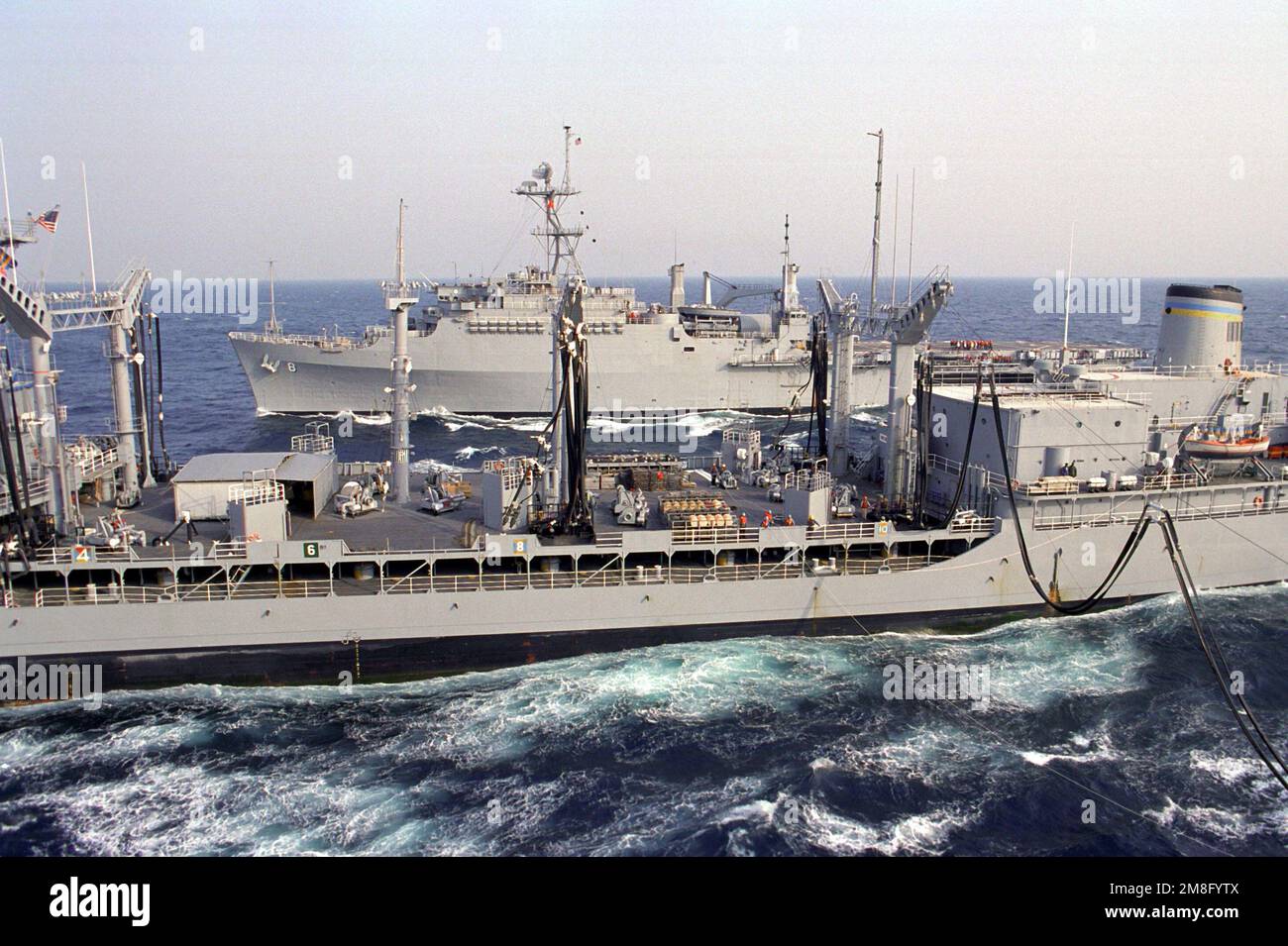 As seen from the amphibious command ship USS BLUE RIDGE (LCC-19) during ...