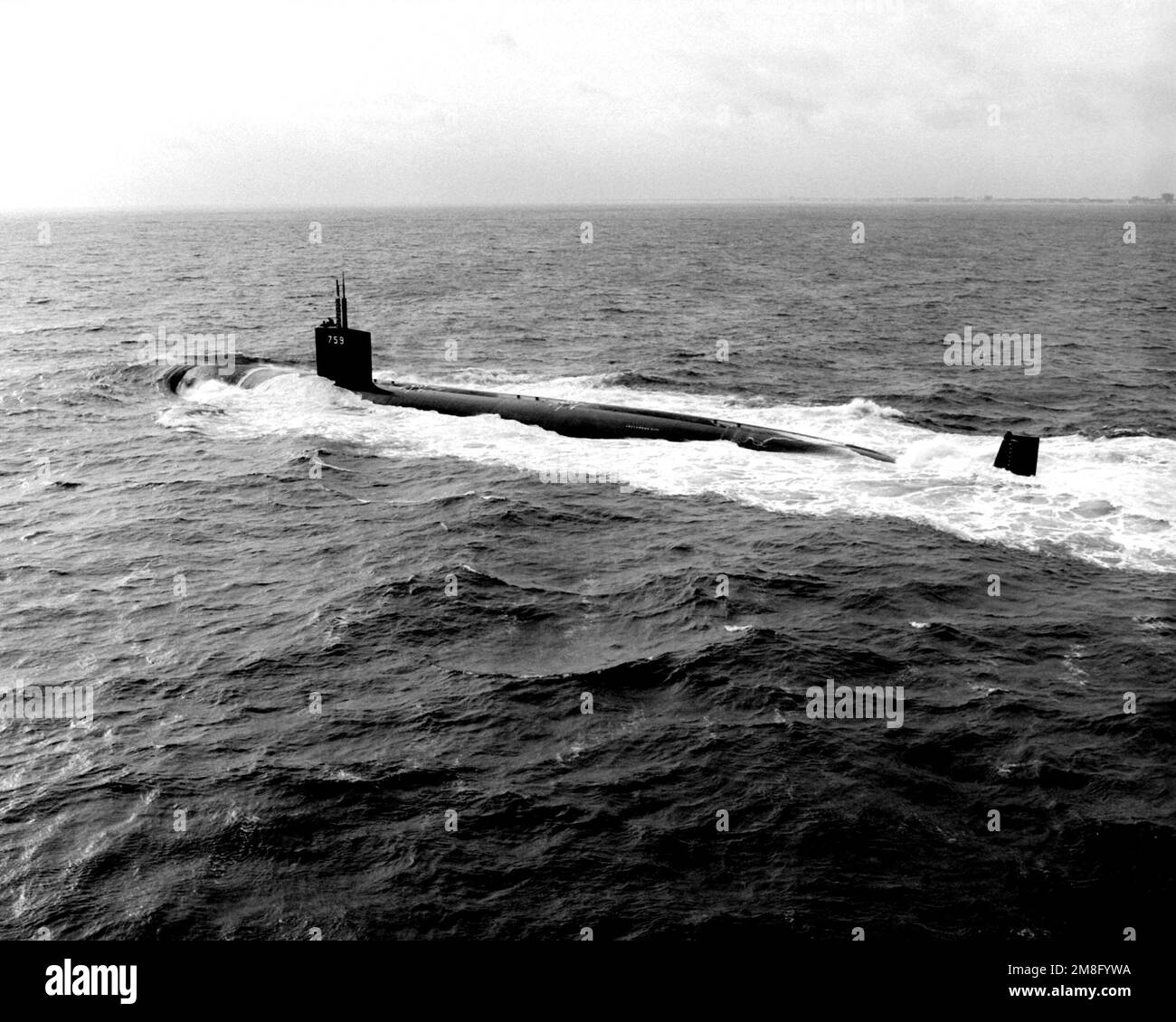 A port quarter view of the nuclear-powered attack submarine JEFFERSON ...