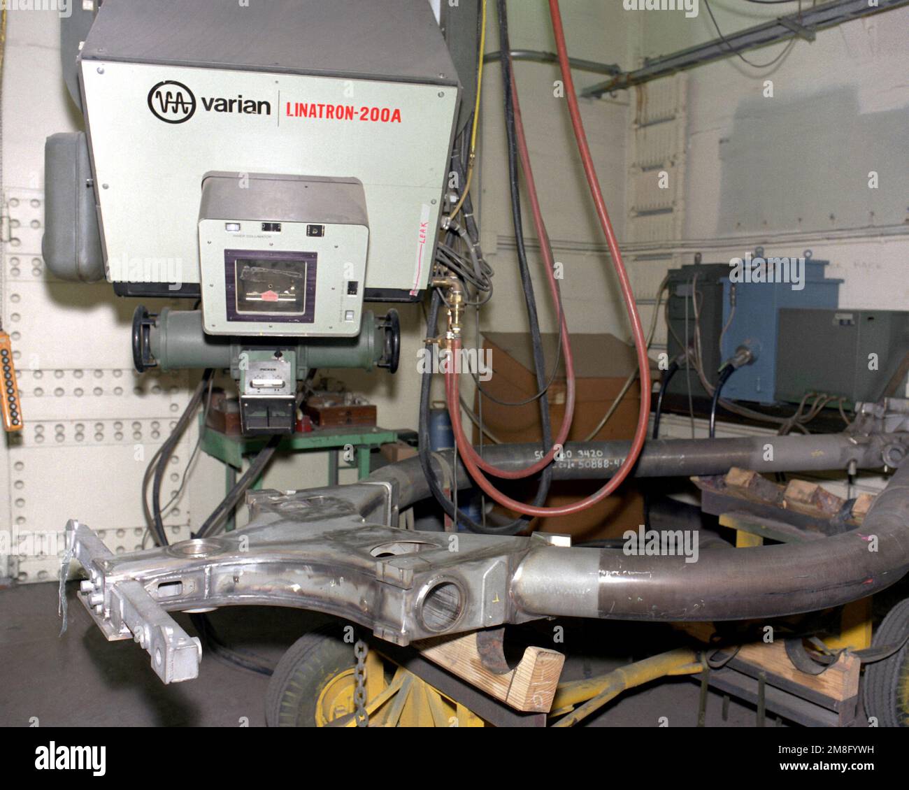 An X-ray machine inspects welds on part of the trail assembly of an M ...