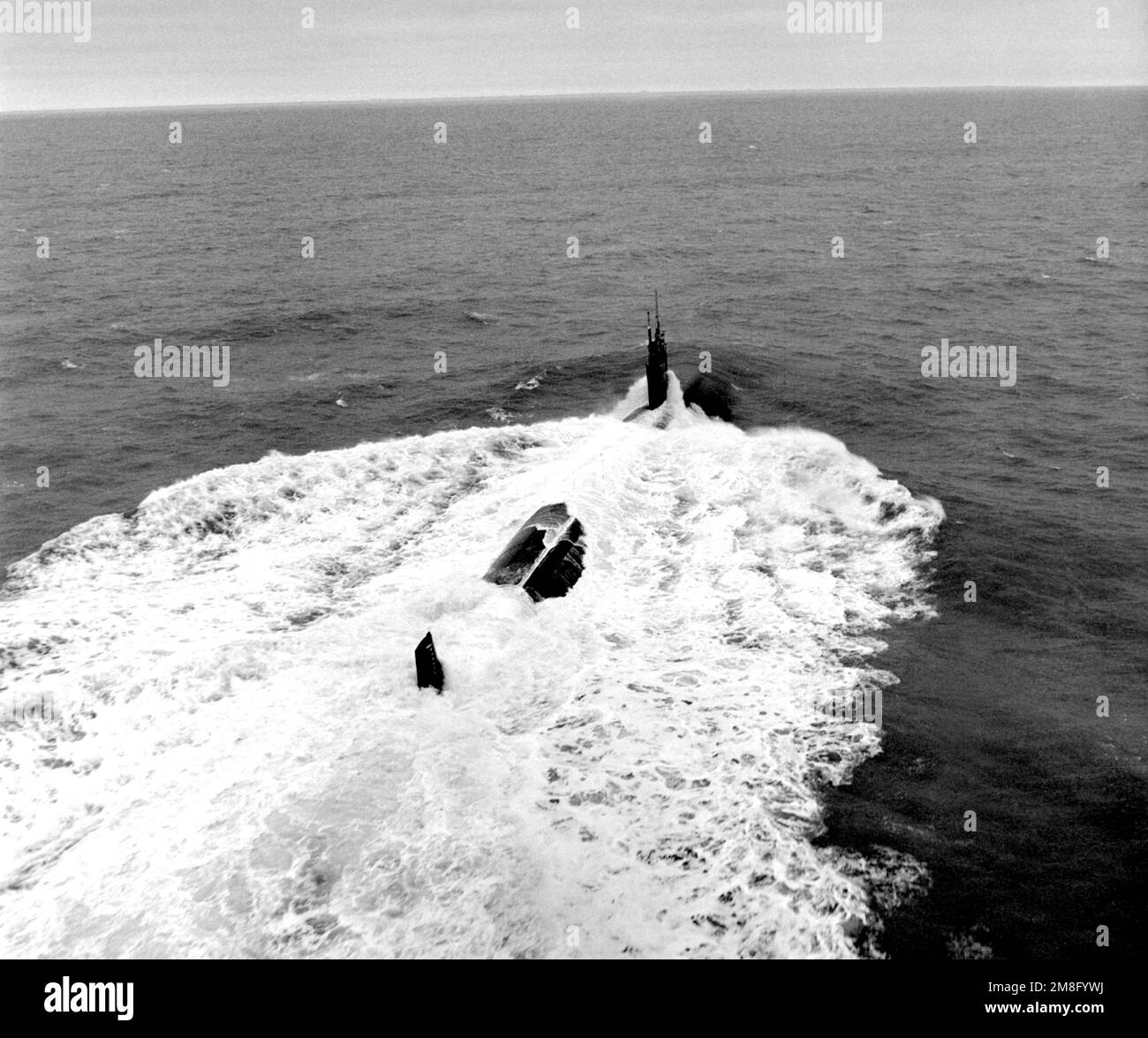 A stern view of the nuclear-powered attack submarine JEFFERSON CITY ...