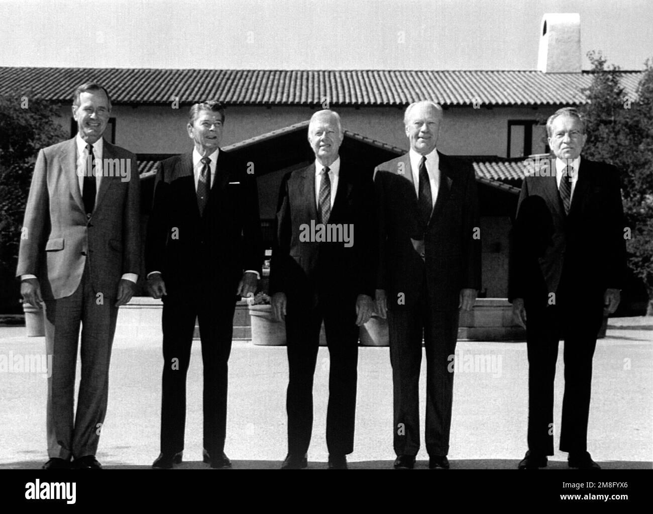 President George H. W. Bush poses for a photograph with four of his ...