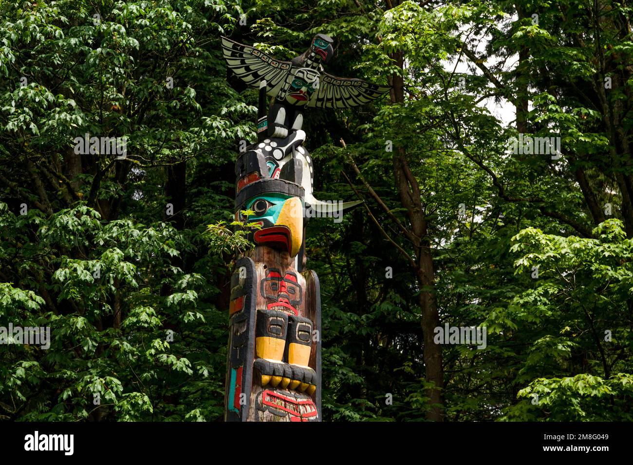 Wooden totem poles in Stanley Park. First Nations culture, travel ...