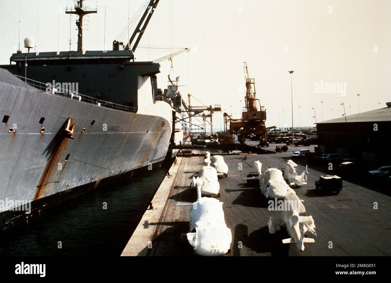UH-60 Black Hawk (Blackhawk) and AH-1 Cobra helicopters are loaded ...