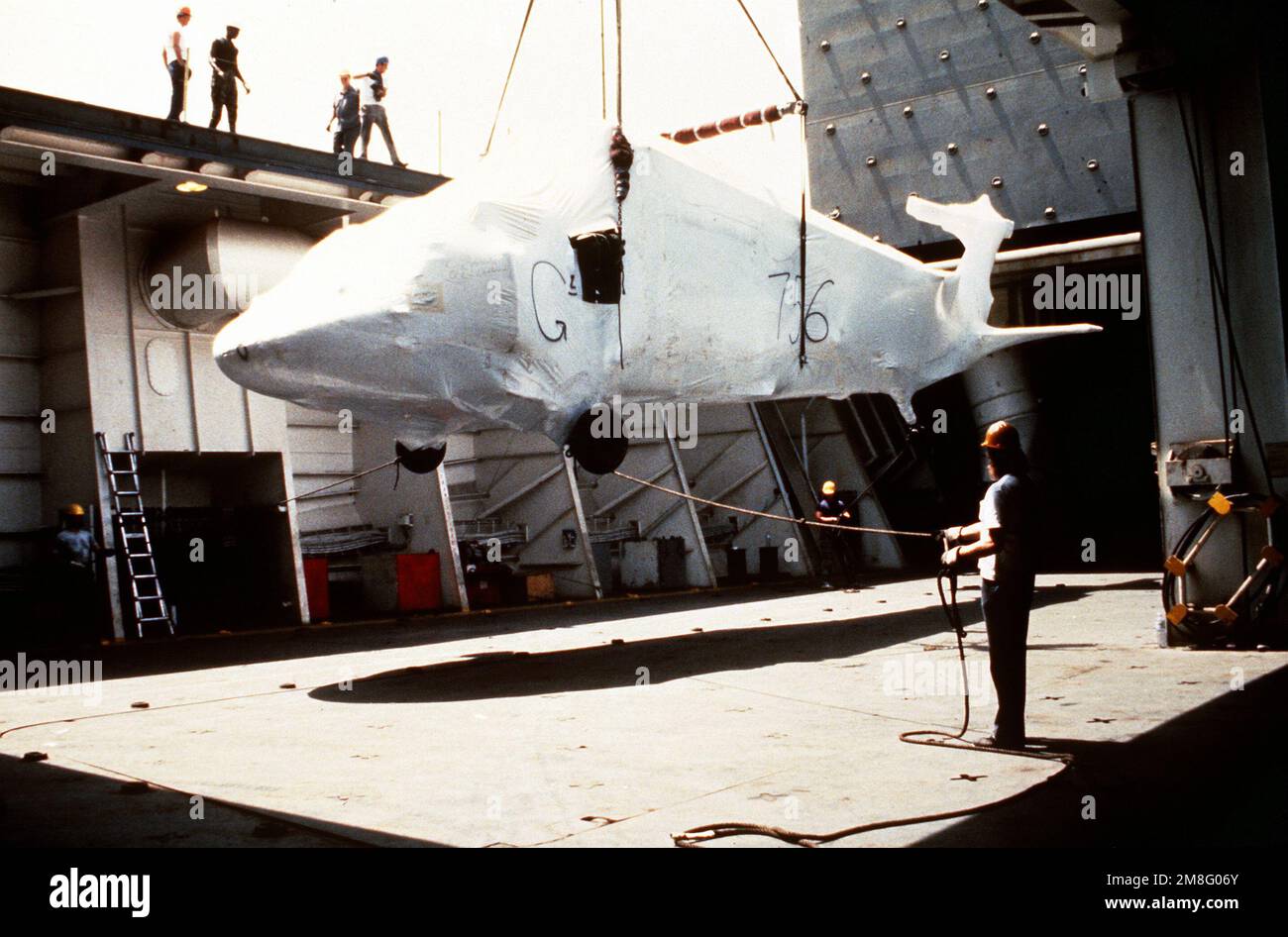 UH-60 Black Hawk (Blackhawk) and AH-1 Cobra helicopters are loaded ...