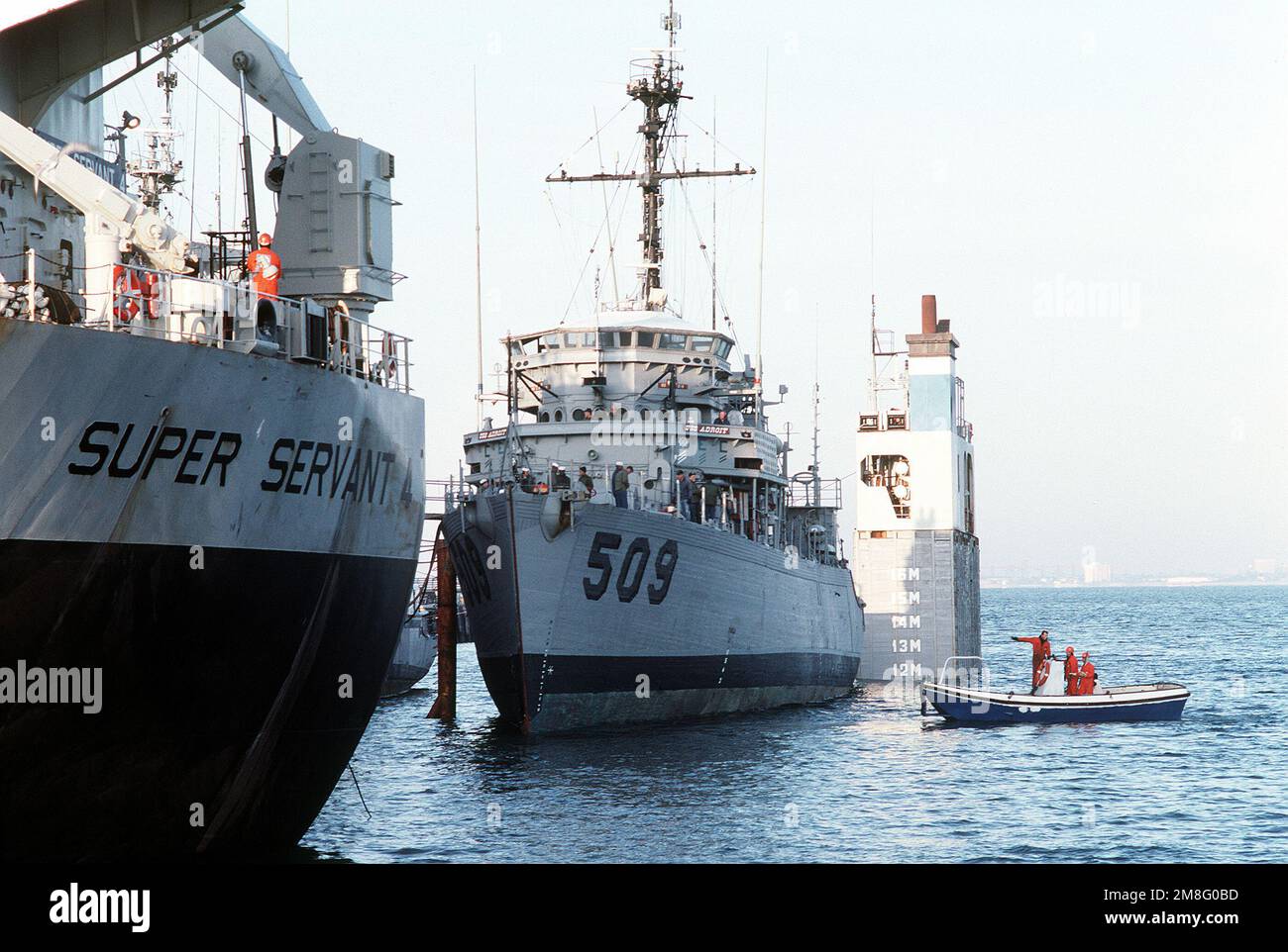The ocean minesweeper USS ADROIT (MSO-509) sits aboard the Dutch heavy ...