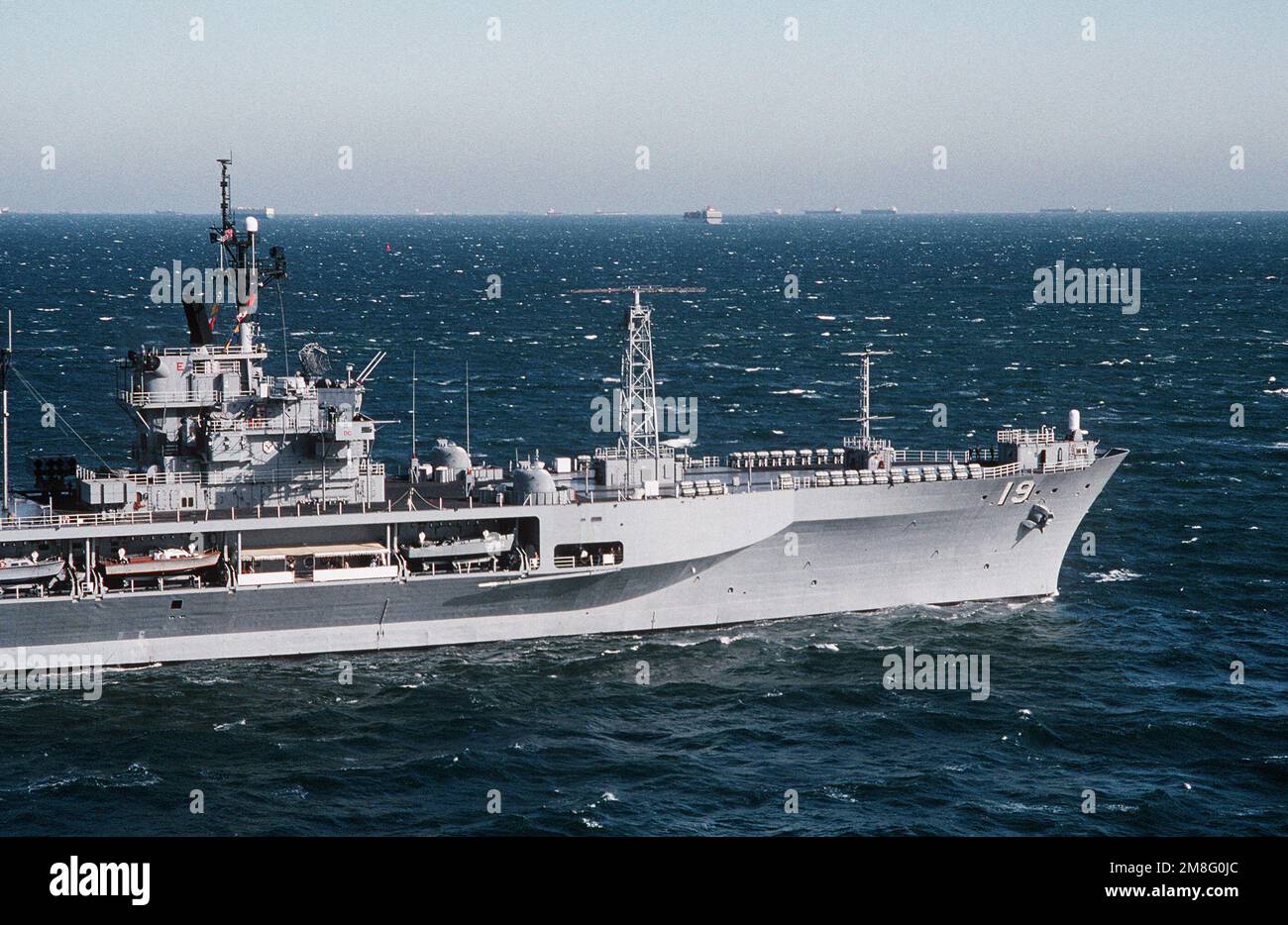 A starboard beam view of the forward portion of the amphibious command ...