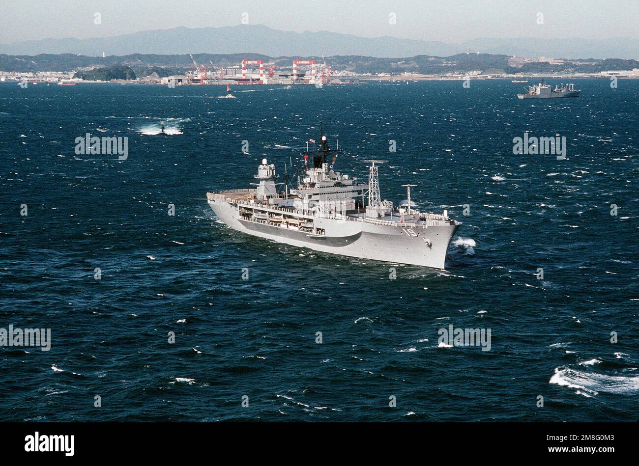 A starboard bow view of the amphibious command ship USS BLUE RIDGE (LCC ...