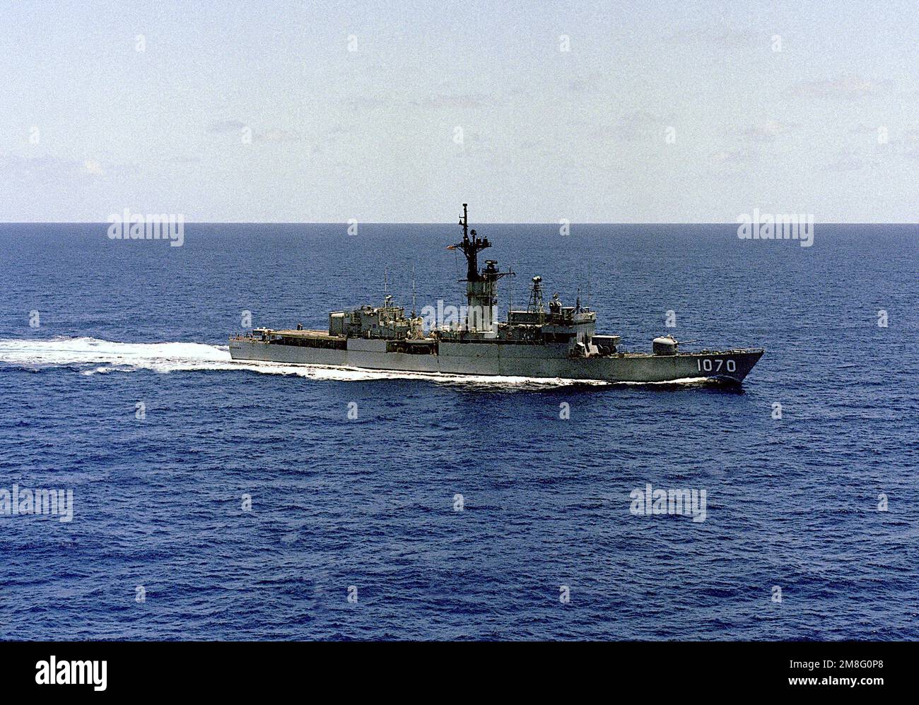 A starboard beam view of the frigate USS DOWNES (FF 1070) underway ...