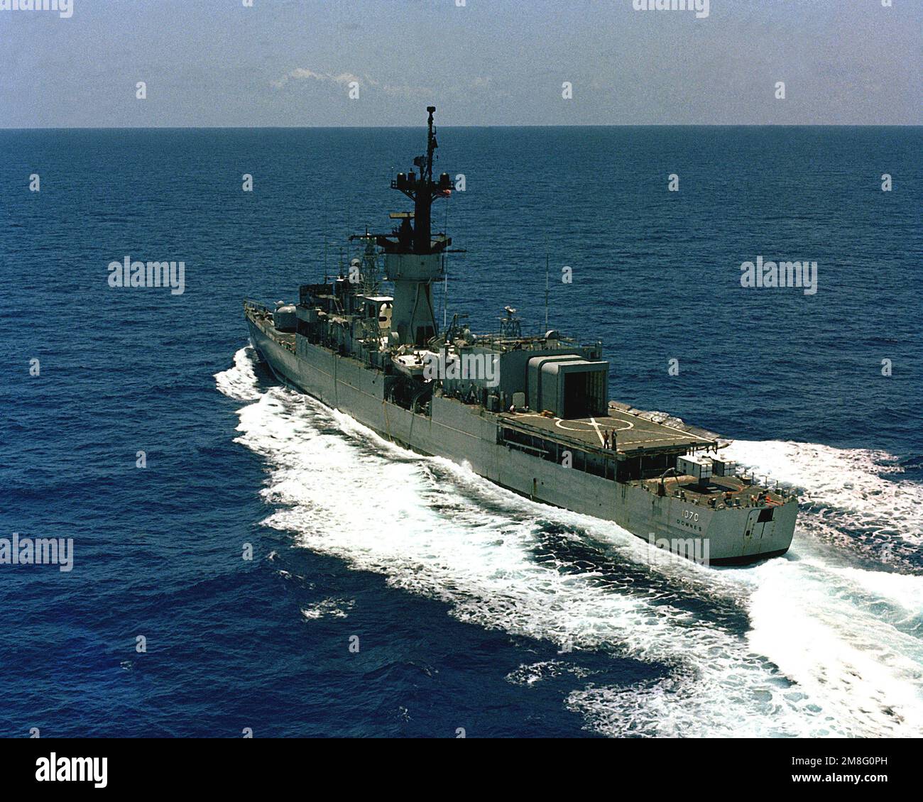 A port quarter view of the frigate USS DOWNES (FF 1070) underway ...