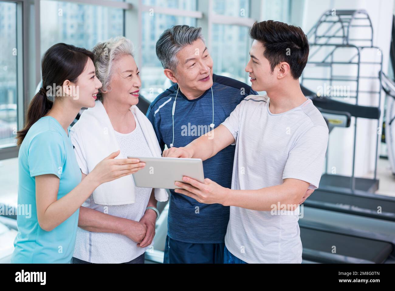 Three under the guidance of personal training in the gym for a workout ...