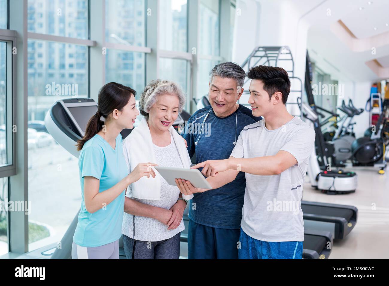 Three under the guidance of personal training in the gym for a workout ...
