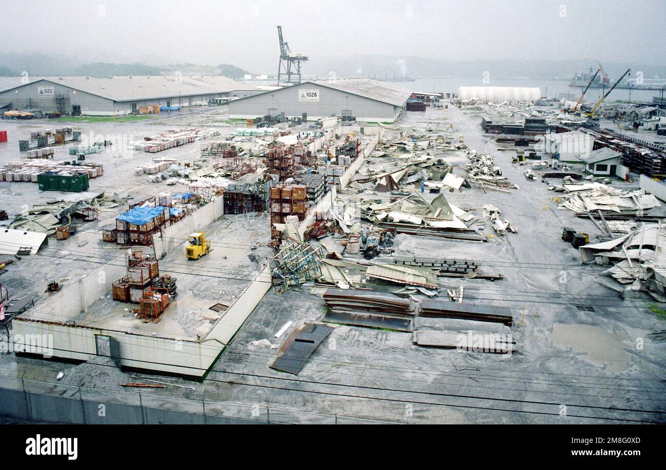 Buildings damaged by ash await clean-up efforts in the aftermath of ...