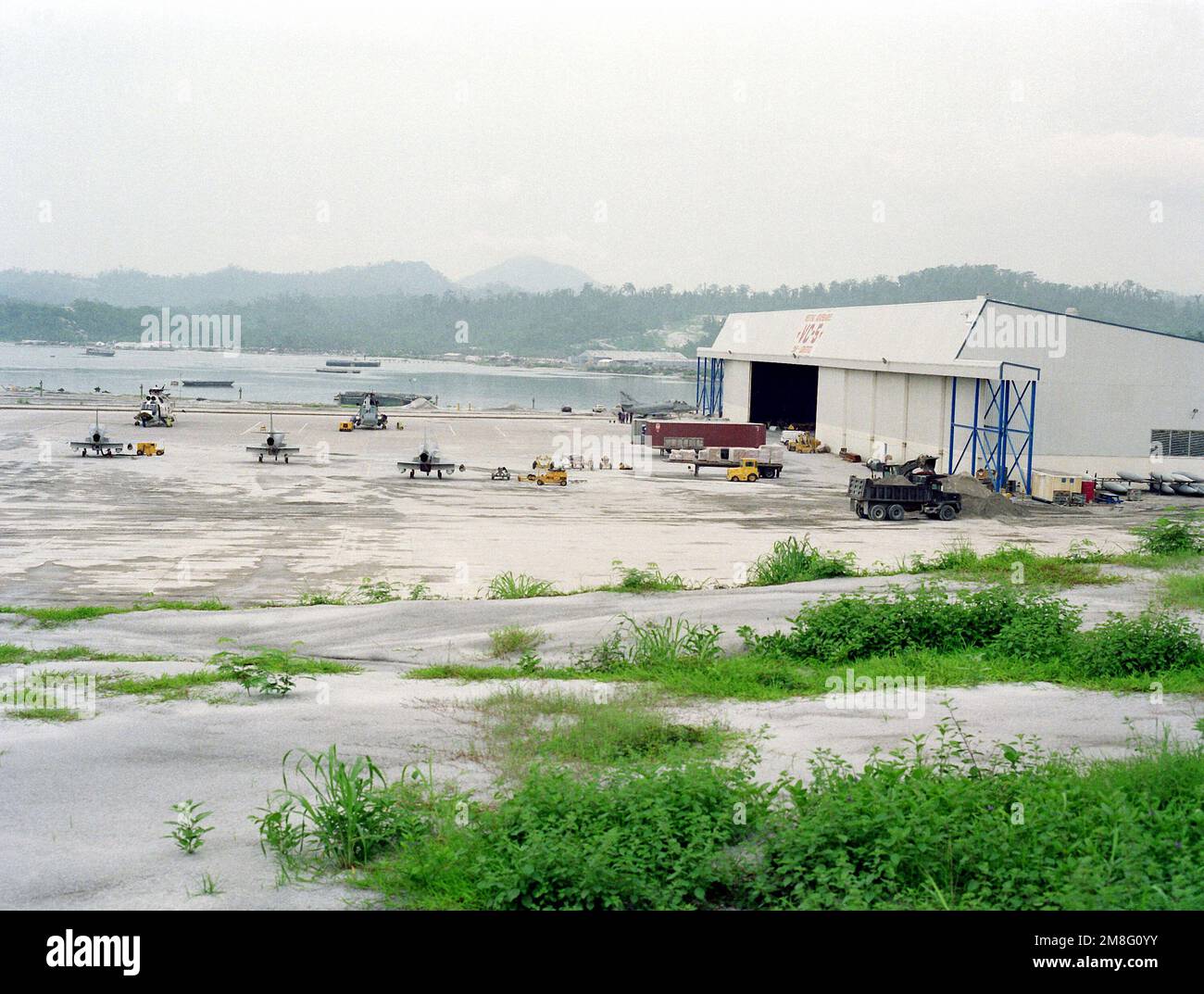 A 4E Skyhawk aircraft are serviced on the flight line near the Fleet ...