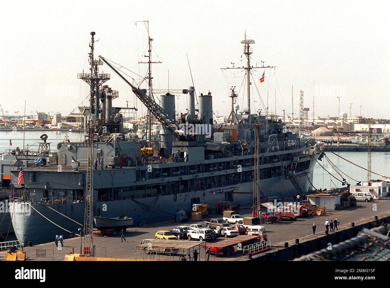 The destroyer tender USS YOSEMITE (AD-19) stands in port. The vessel is ...
