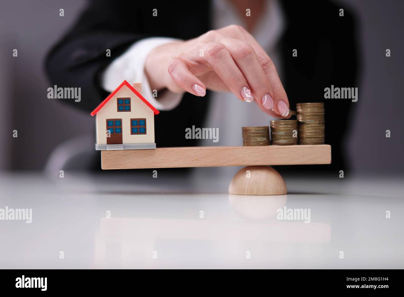 House Model Balance Equilibrium Concept. Real Estate Money Stock Photo ...