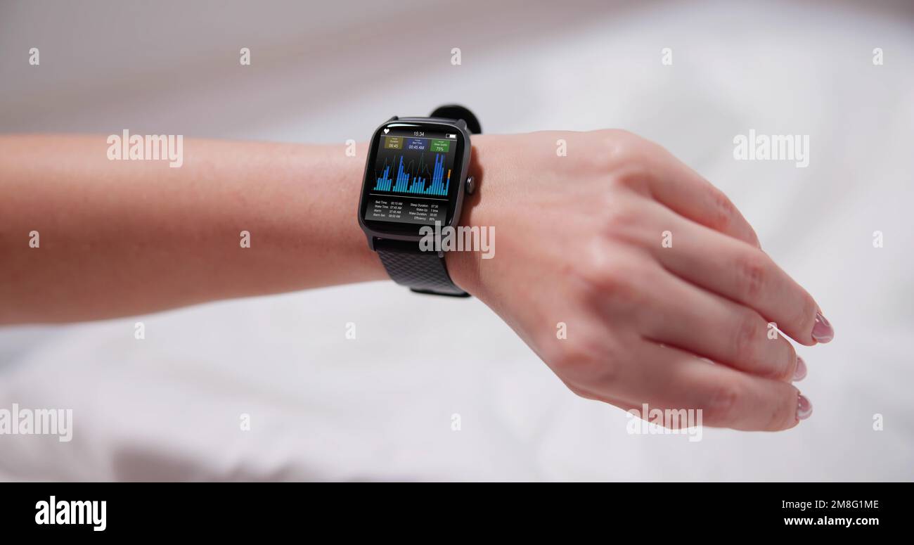 Smart Watch Showing Heartbeat Monitor On Woman's Hand Stock Photo - Alamy