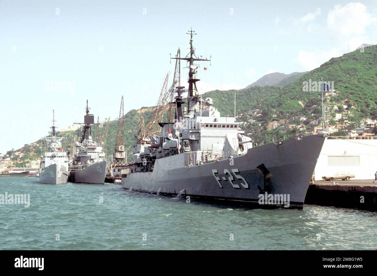 The frigate USS AYLWIN (FF-1081), left, and the guided missile ...
